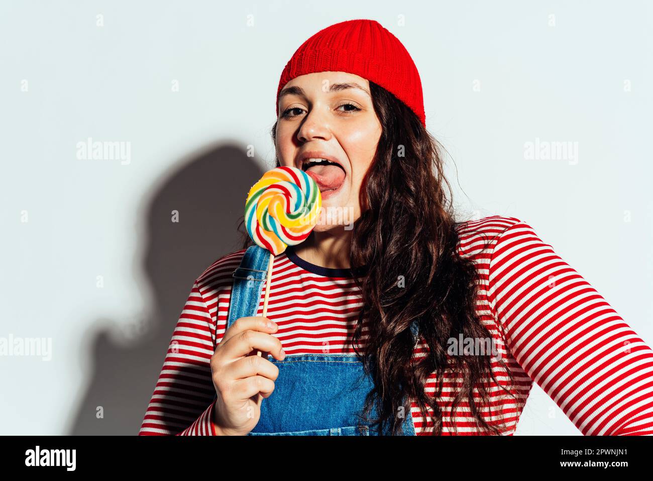 Plus size woman model posing in studio and having fun. Big model ...