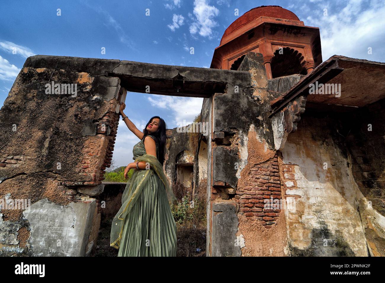 Nandini Singh, a female model poses for photos at the old fort near of ...