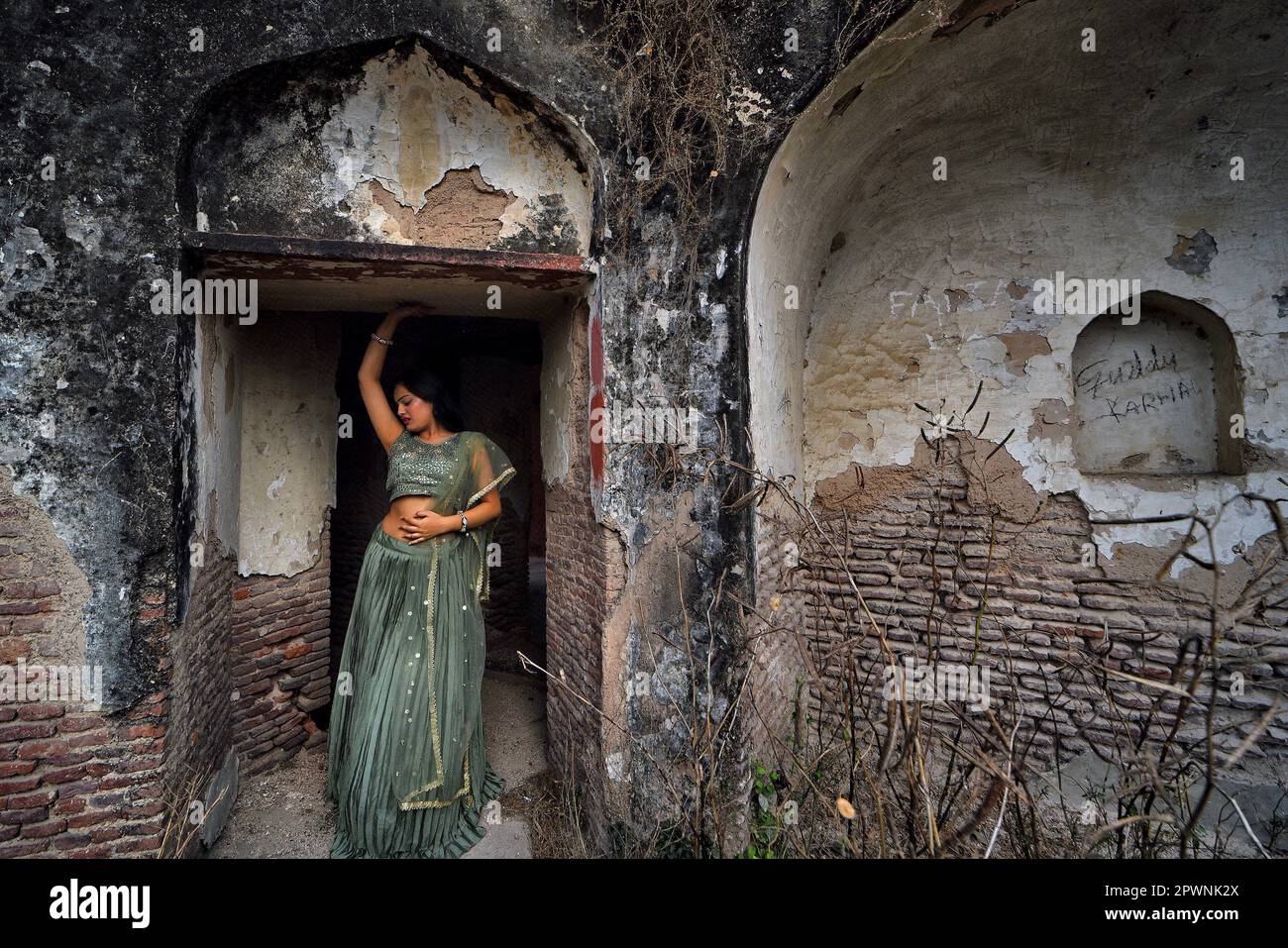 Nandini Singh, a female model poses for photos at the old fort near of ...