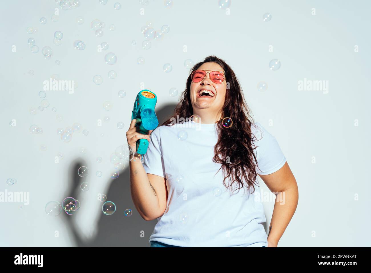 Plus size woman model posing in studio and having fun Stock Photo - Alamy