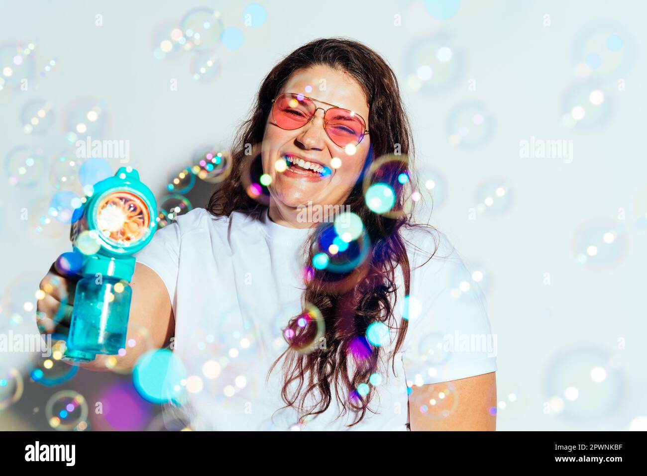 Plus size woman model posing in studio and having fun Stock Photo - Alamy