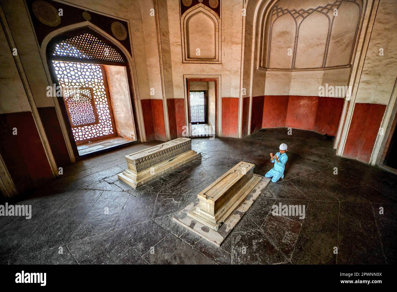Delhi, India. 21st Apr, 2023. A kid offers prayers inside the Humayun ...
