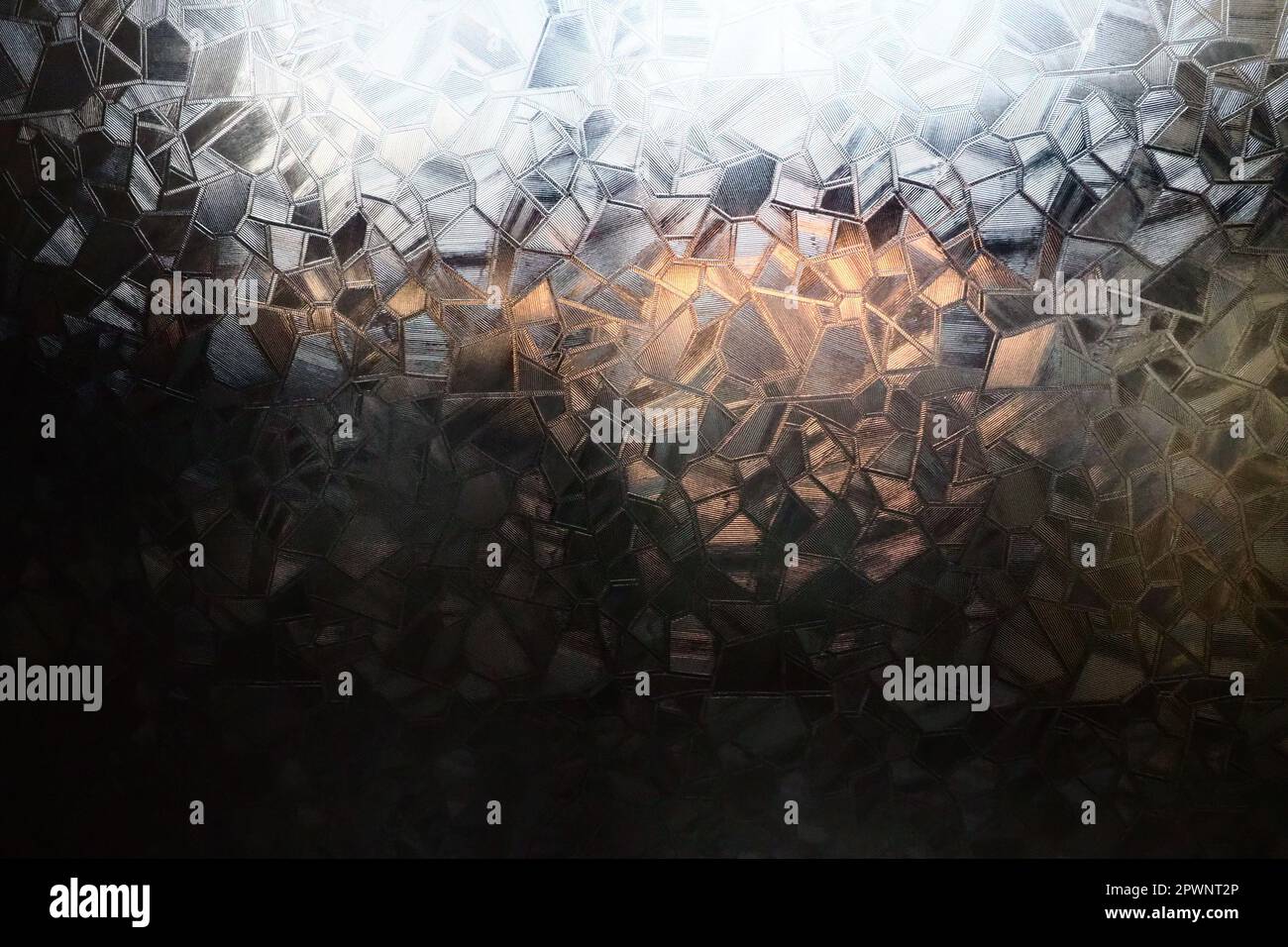 Fluted glass with backlight. Beautiful multicolored refraction of light ...