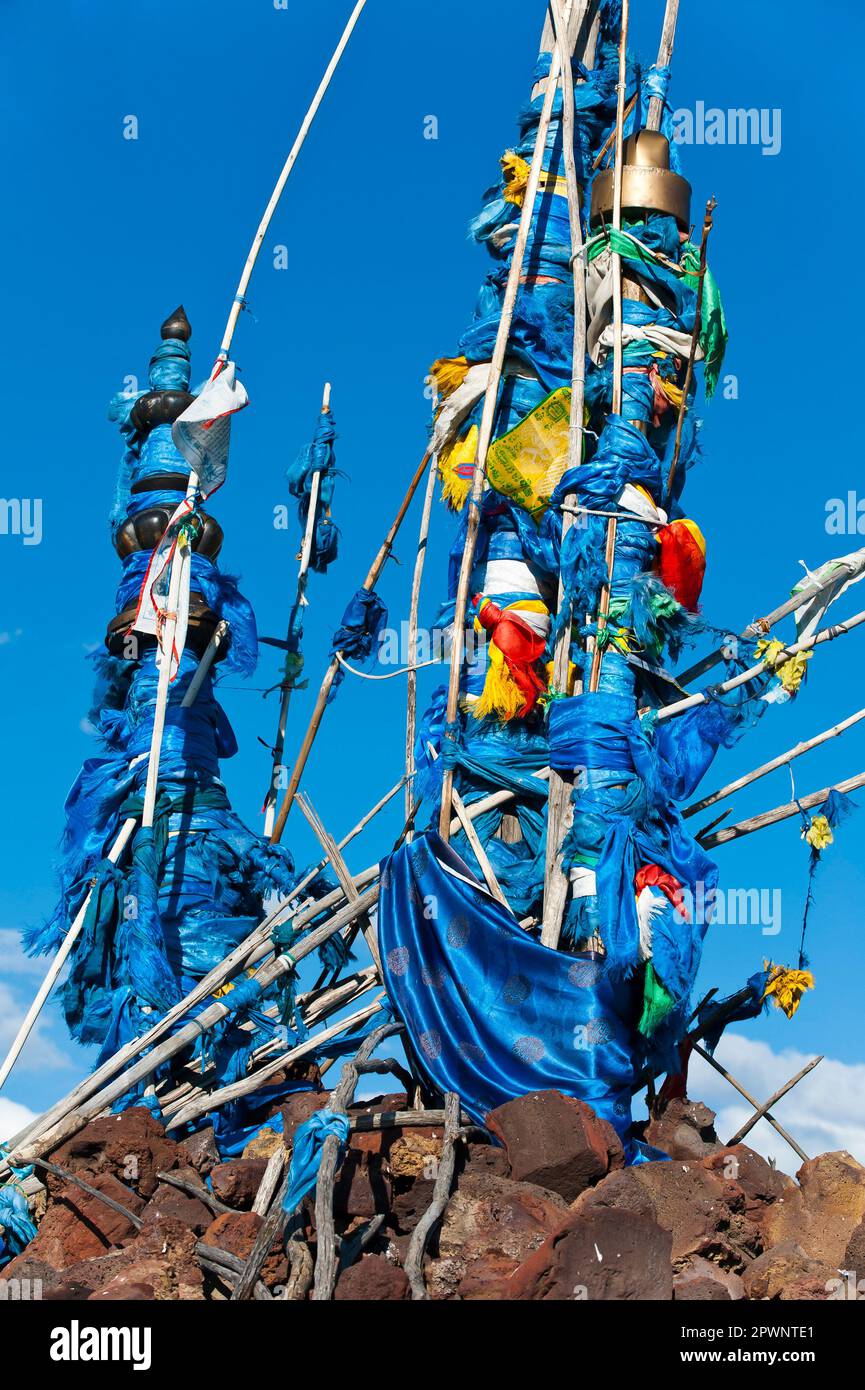 The colorful top of a so-called "Owoo", a pile of stones with colorful ...