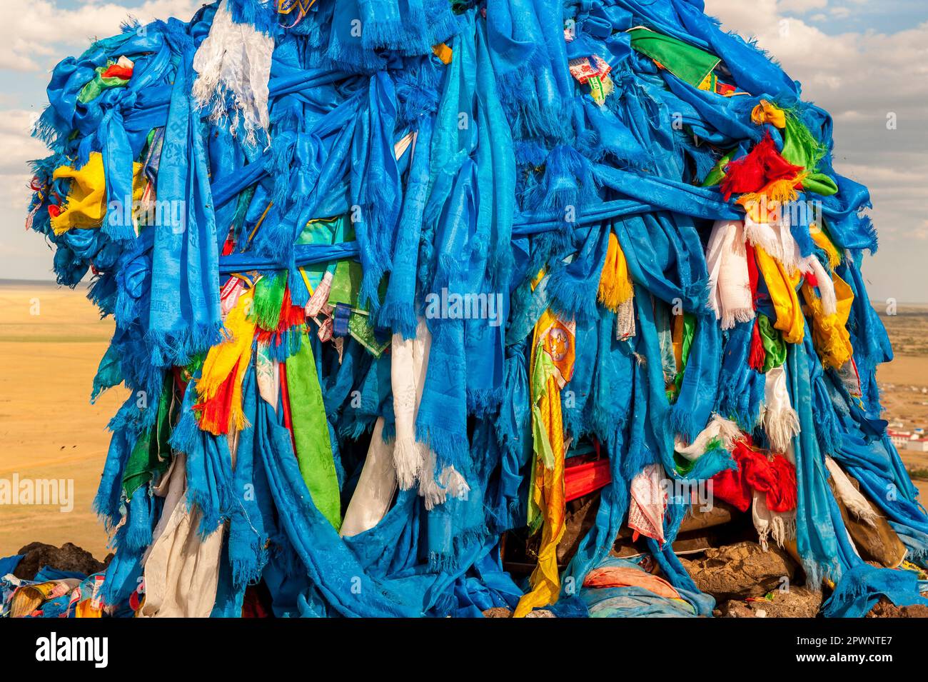 The colorful top of a so-called "Owoo", a pile of stones with colorful ...