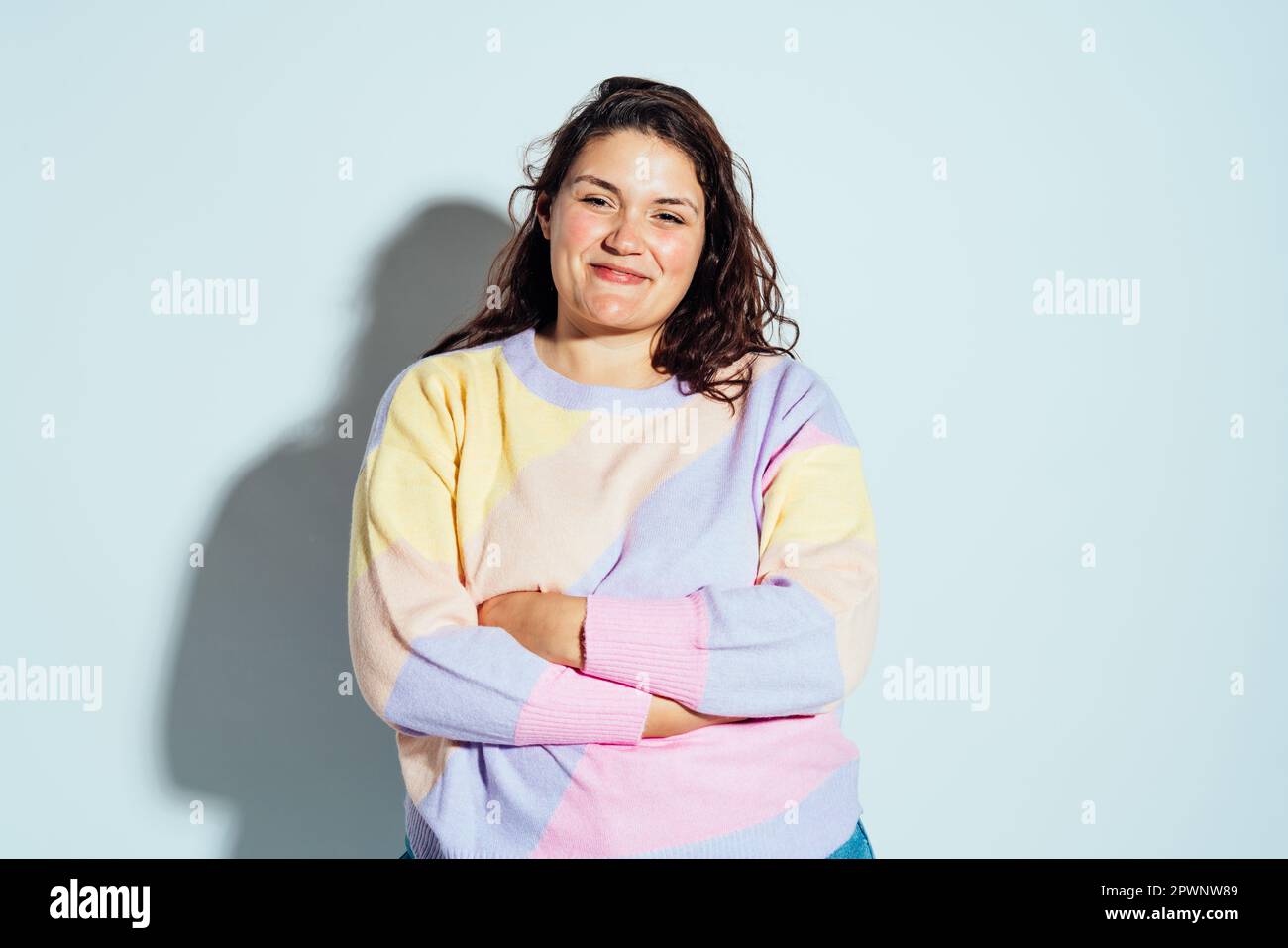 Plus size woman model posing in studio and having fun. Shots taken on ...