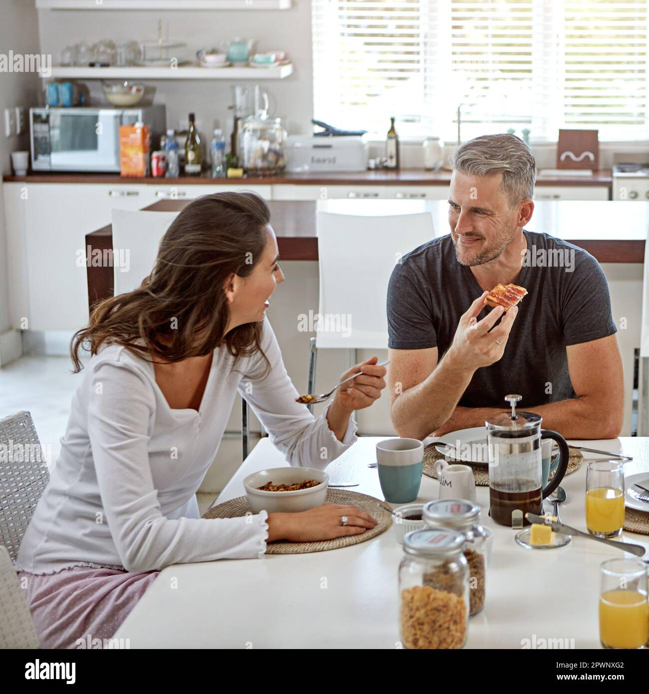 Our bodies need a solid and healthy breakfast. a couple enjoying ...