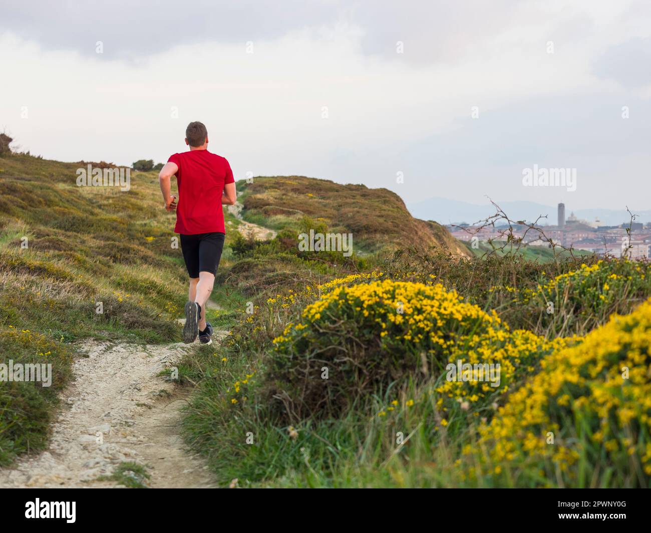 Man running on mountain cloud hi-res stock photography and images - Alamy
