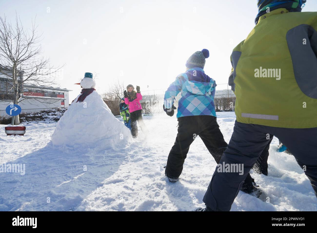 Children playing in snow Stock Photo - Alamy