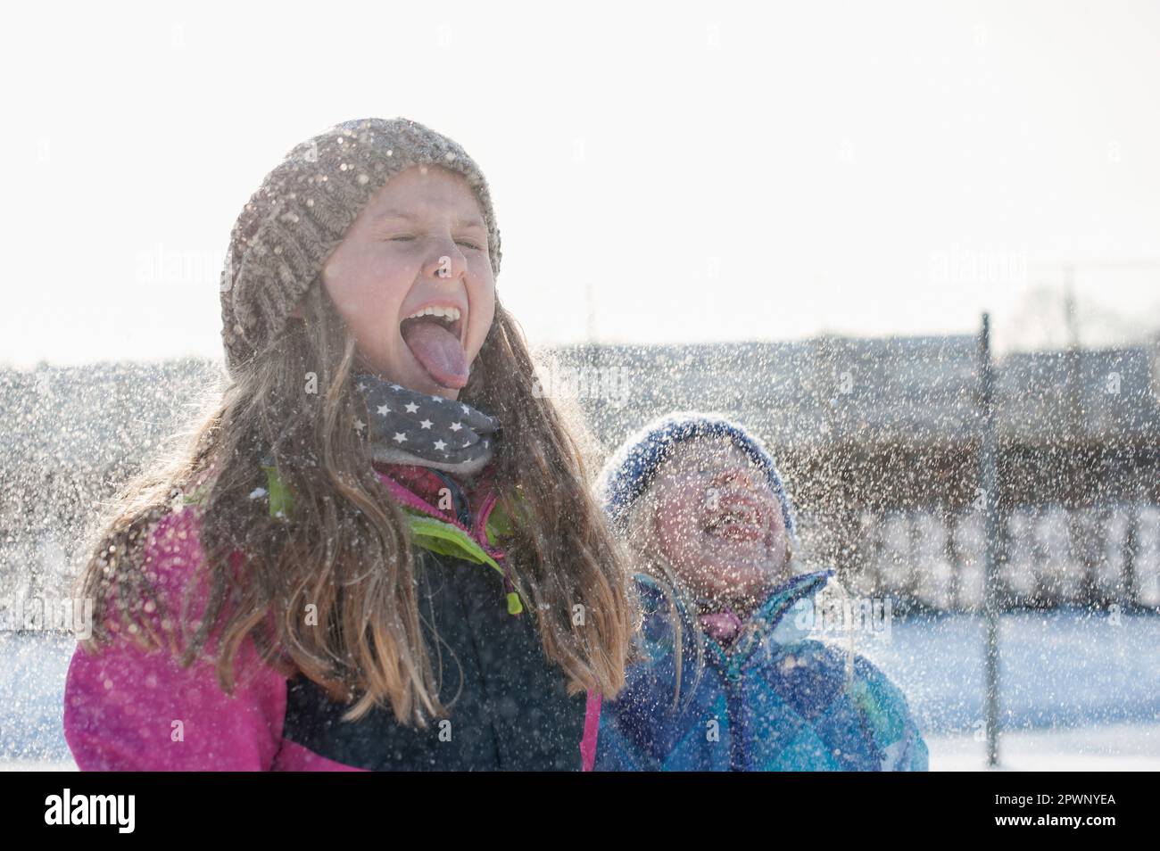 Two girls sticking tongue hi-res stock photography and images - Alamy