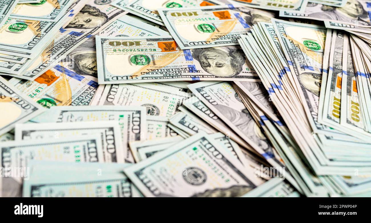 Money heap, many dollar bills background Stock Photo - Alamy