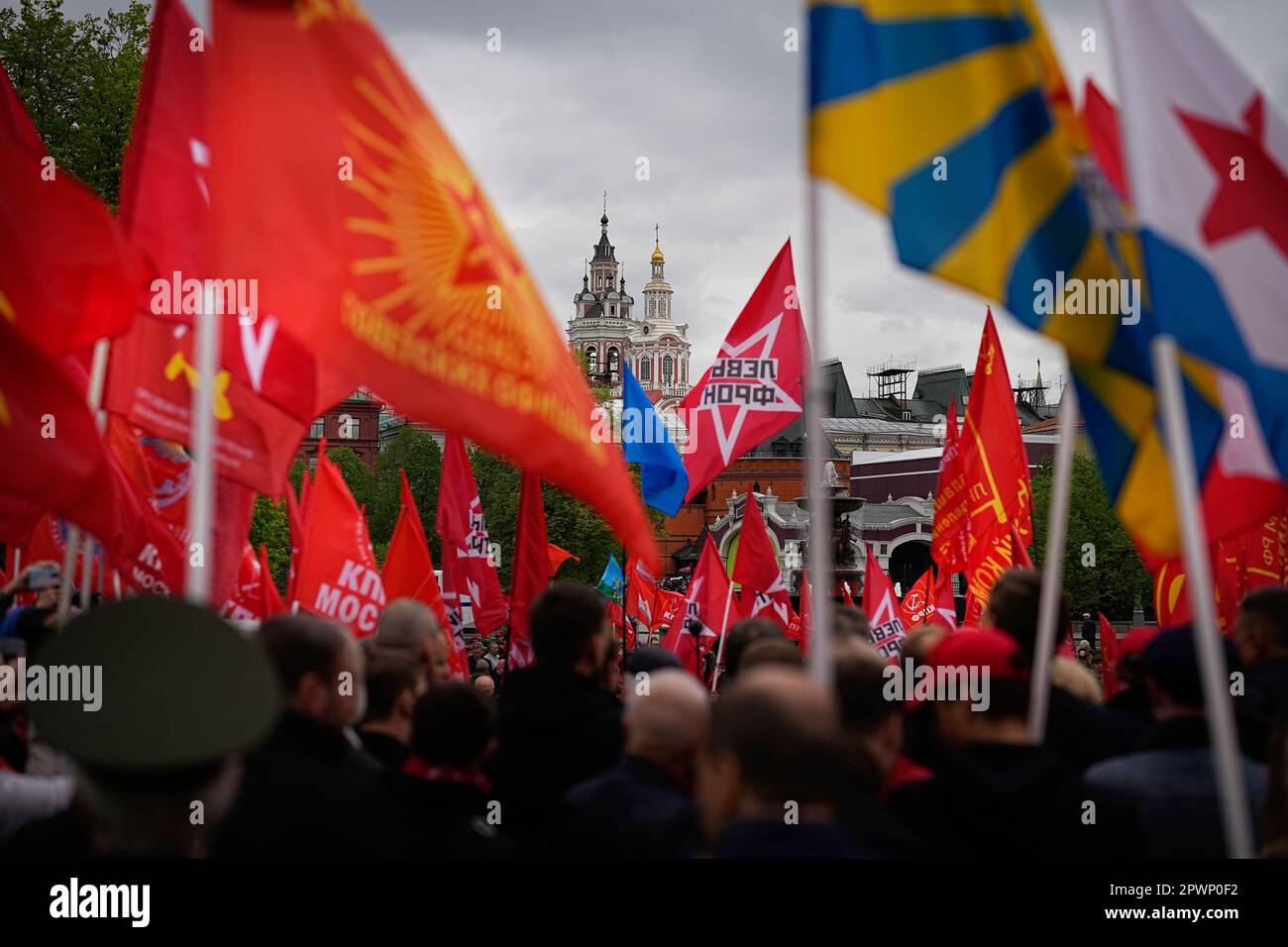 Communists party supporters with red flags gather to mark Labor Day ...
