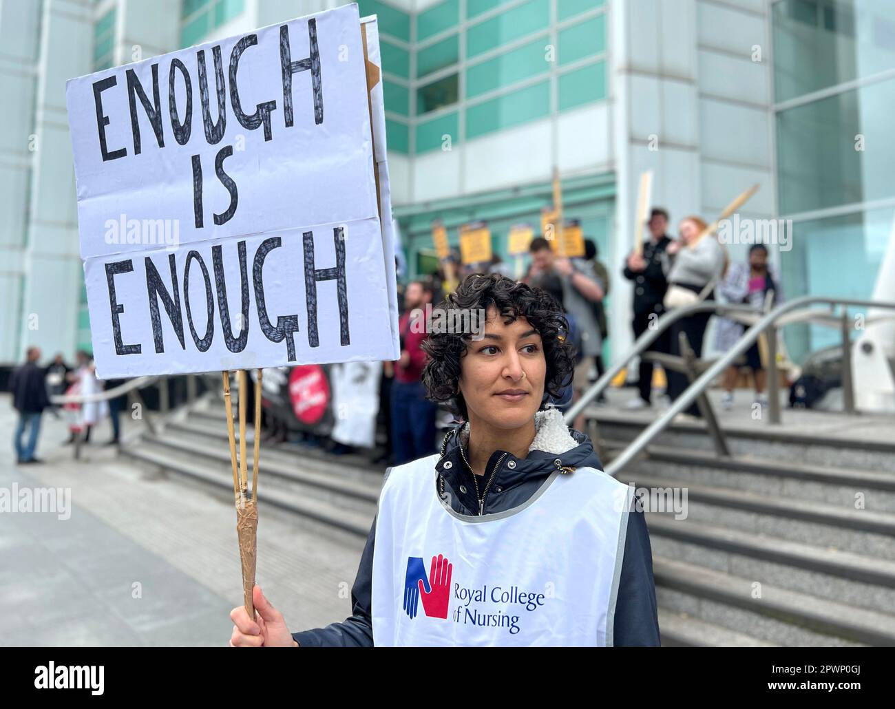 Cancer care nurse Preya Assi, 36, on the picket line outside University ...