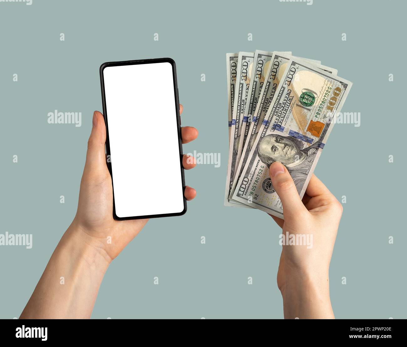 Hand holding mobile phone screen mockup and paper money, dollars ...
