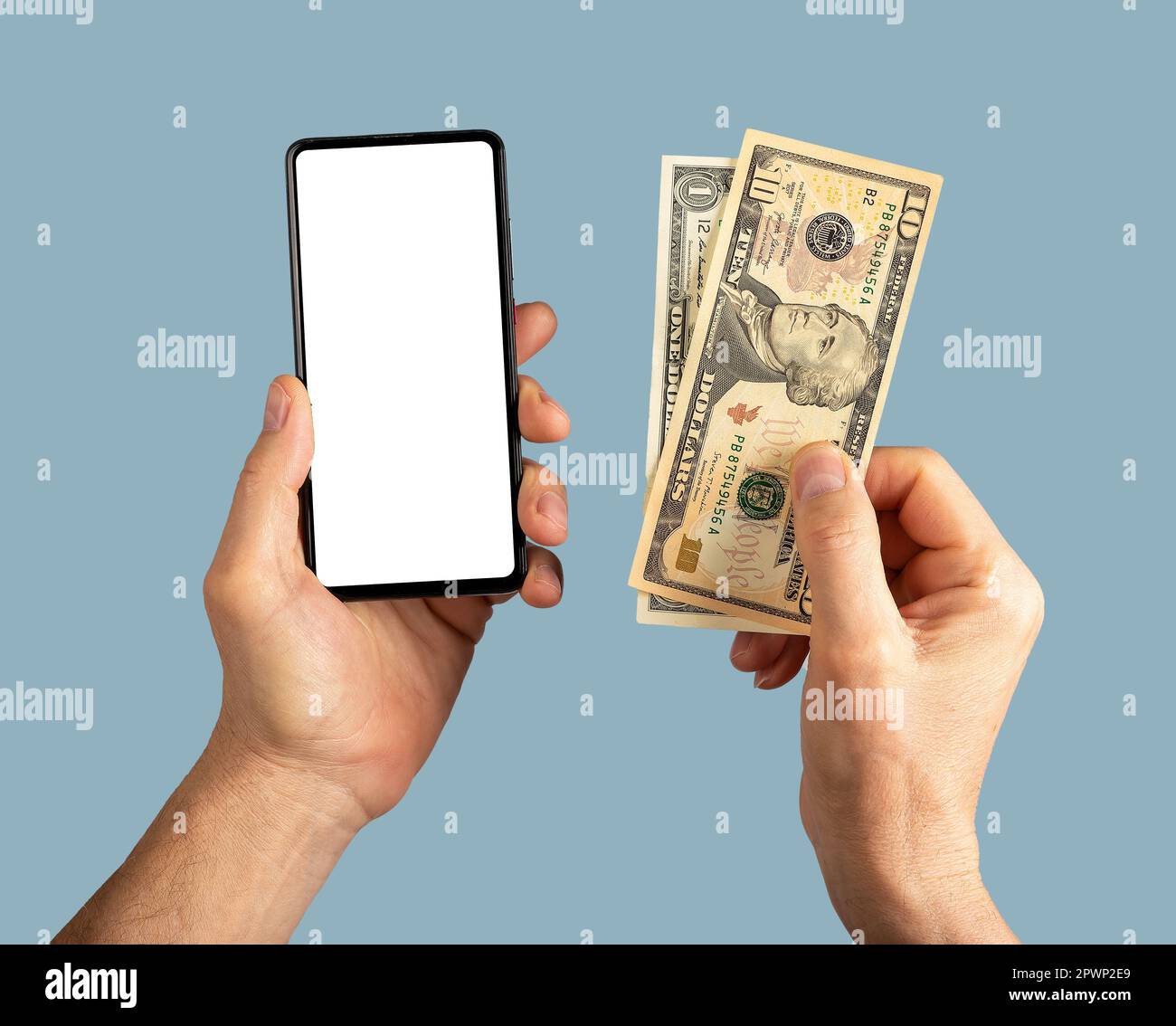 Hand holding mobile phone screen mockup and paper money, dollars ...