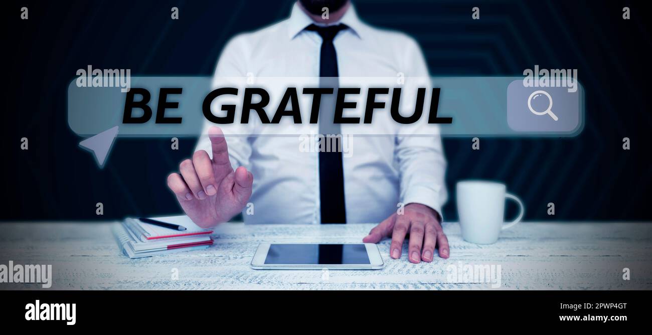 Sign displaying Be Grateful, Word Written on feeling or showing an ...
