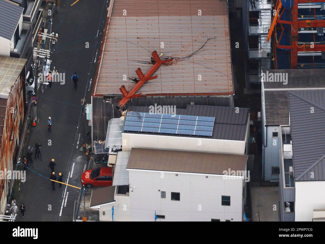 A steel frame falls on roofs in Osaka City, Osaka Prefecture on May 1 ...