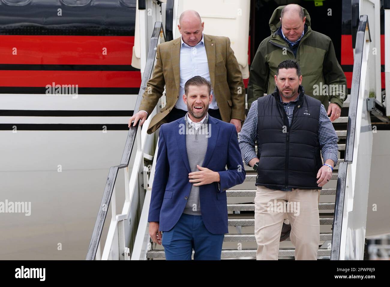 Eric Trump (left) arrives at Aberdeen International Airport, in Dyce ...