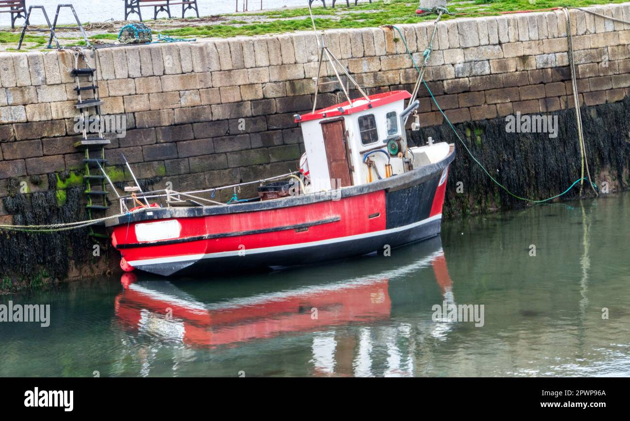 red fishing boat Stock Photo - Alamy