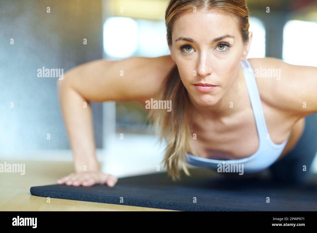 Im making great progress. A beautiful young woman working out at the ...