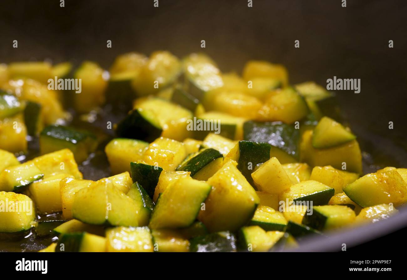 Sliced courgette zucchini frying hi-res stock photography and images ...