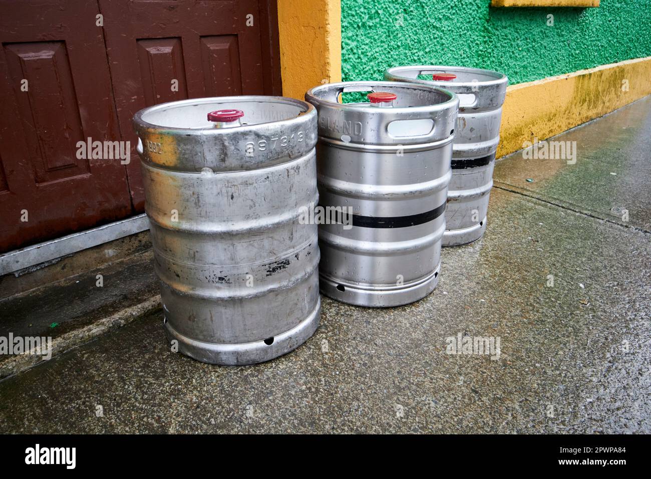 three full beer barrels left outside a pub in county donegal republic ...