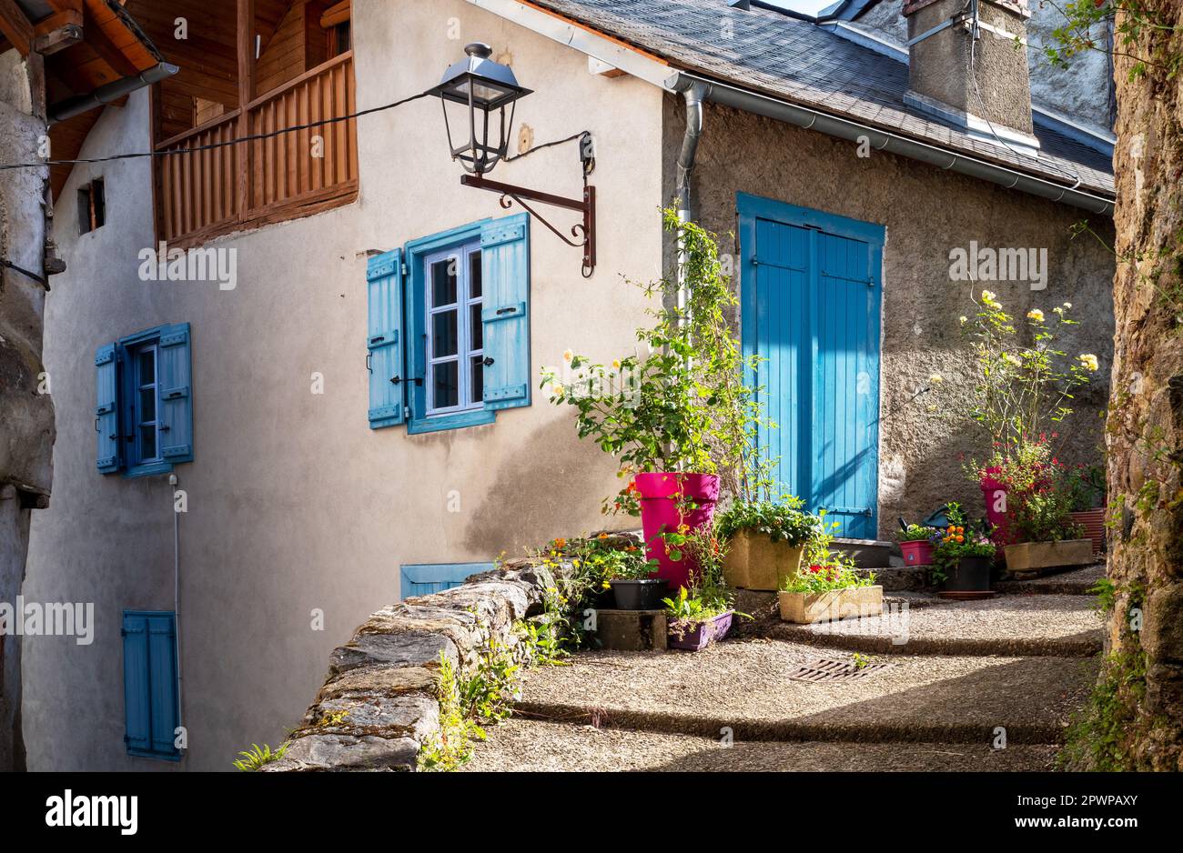typical street of a french village with flowers Stock Photo - Alamy
