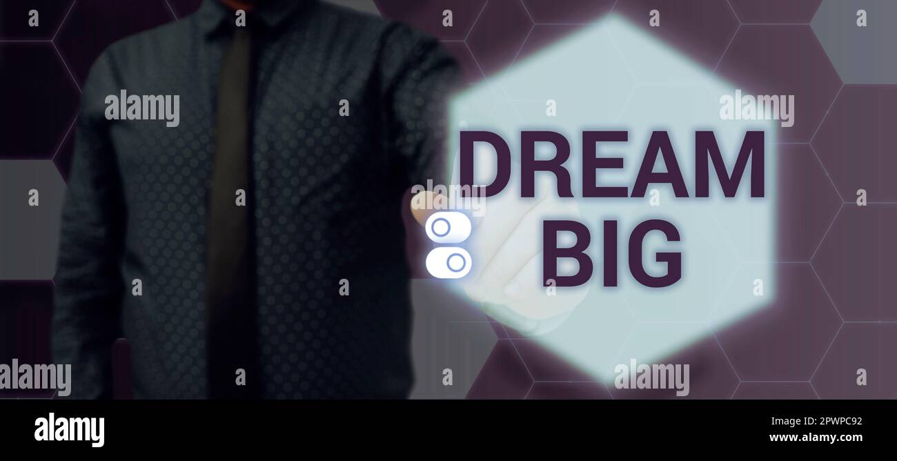 Hand writing sign Dream Big, Business overview To think of something ...