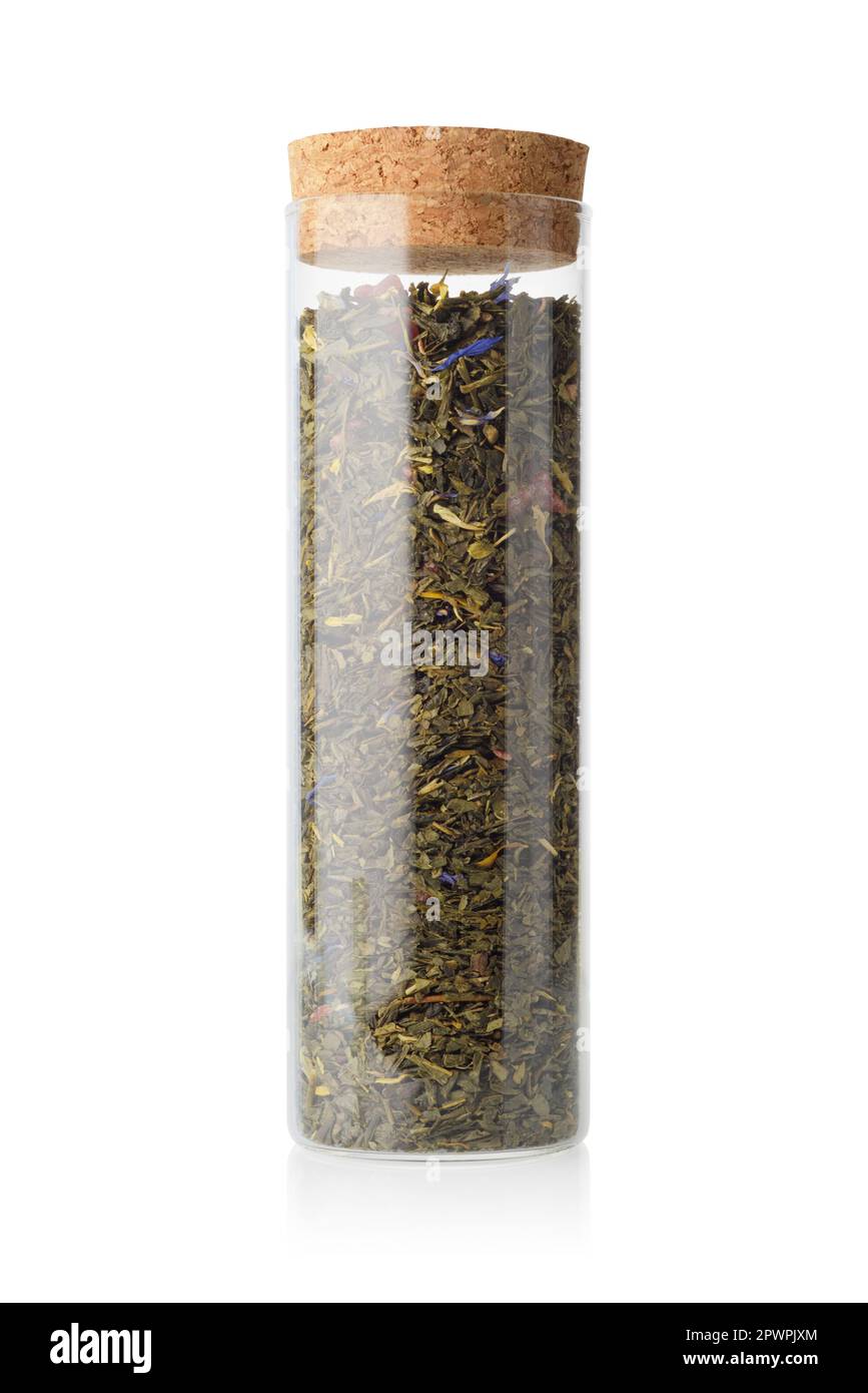 Glass jar with dry green tea isolated on white background Stock Photo ...