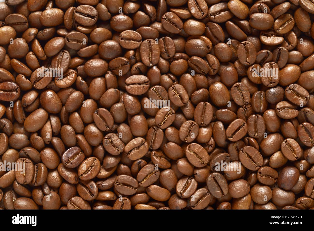 Roasted coffee beans texture or background. Close up, top view Stock ...