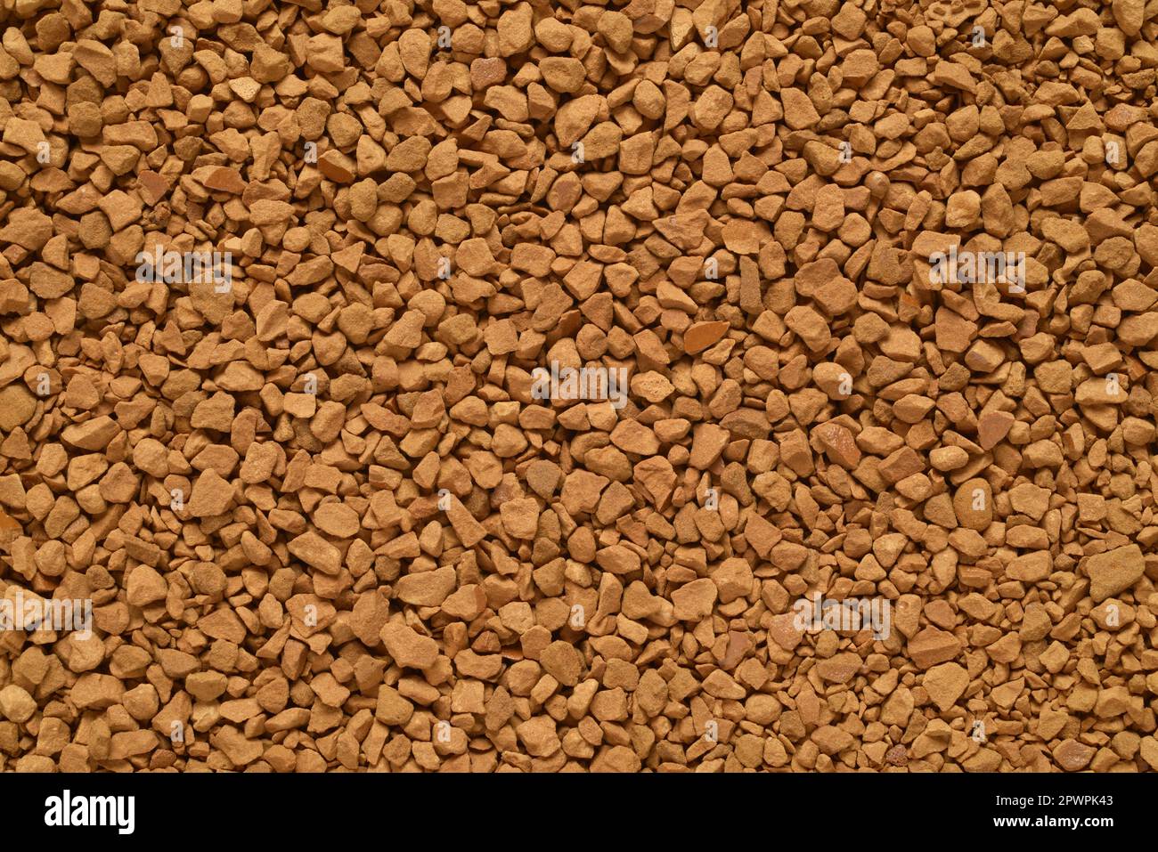 Instant coffee granules texture background. Top view Stock Photo - Alamy