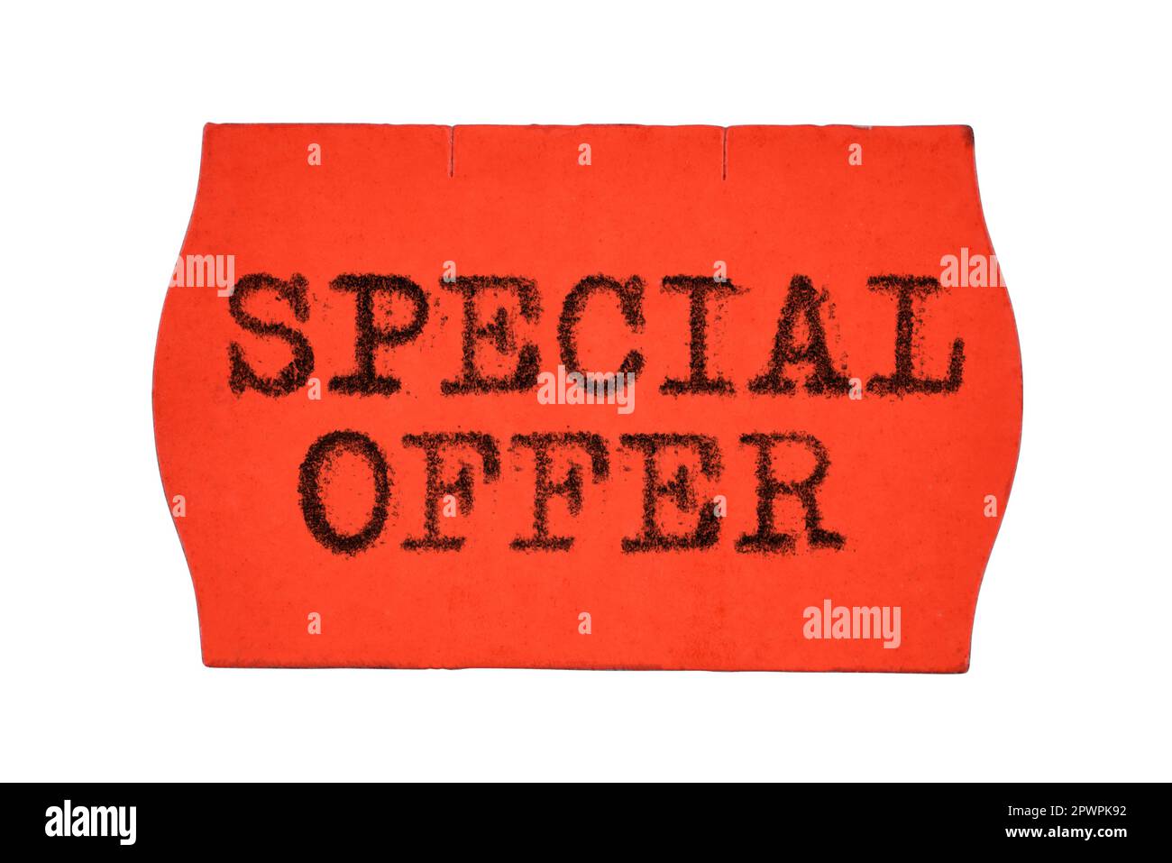 Special Offer printed with typewriter font on red price tag sticker ...