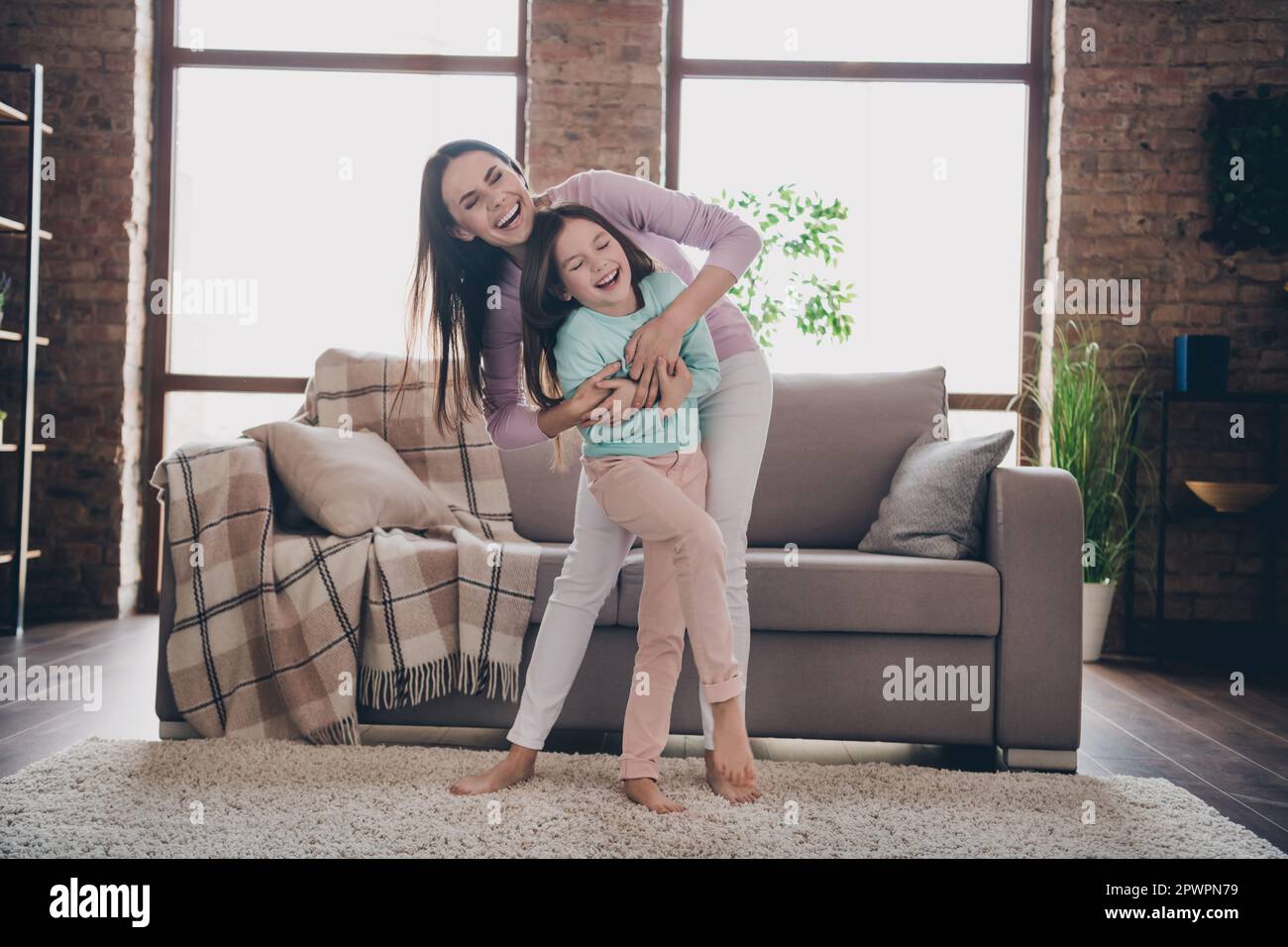 Full length photo of funky excited mommy big sister miss her sibling ...