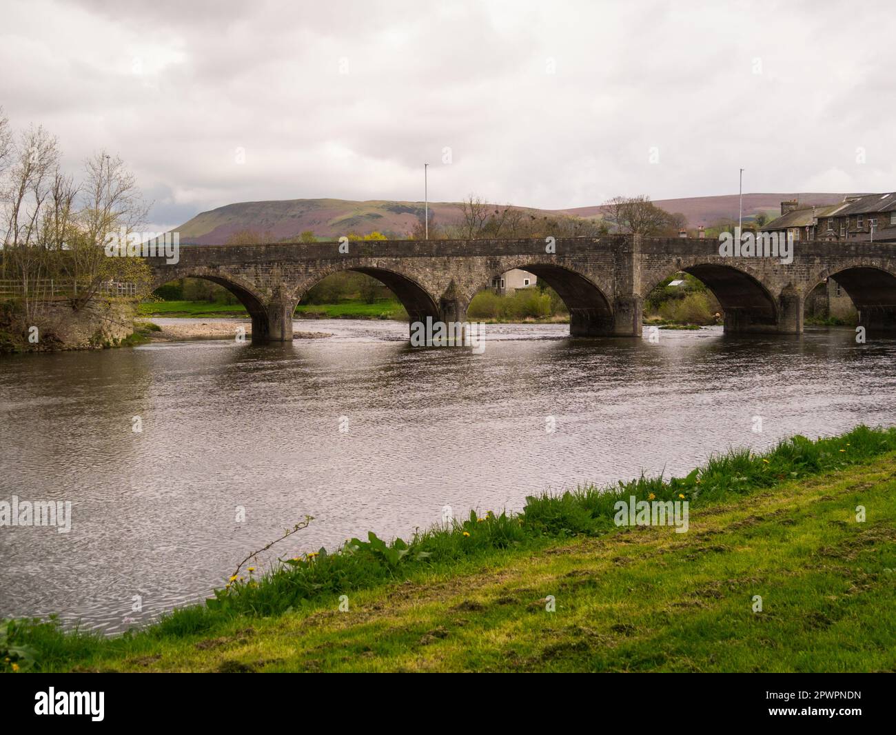 View across the River Wye to five span road bridge in the market town ...