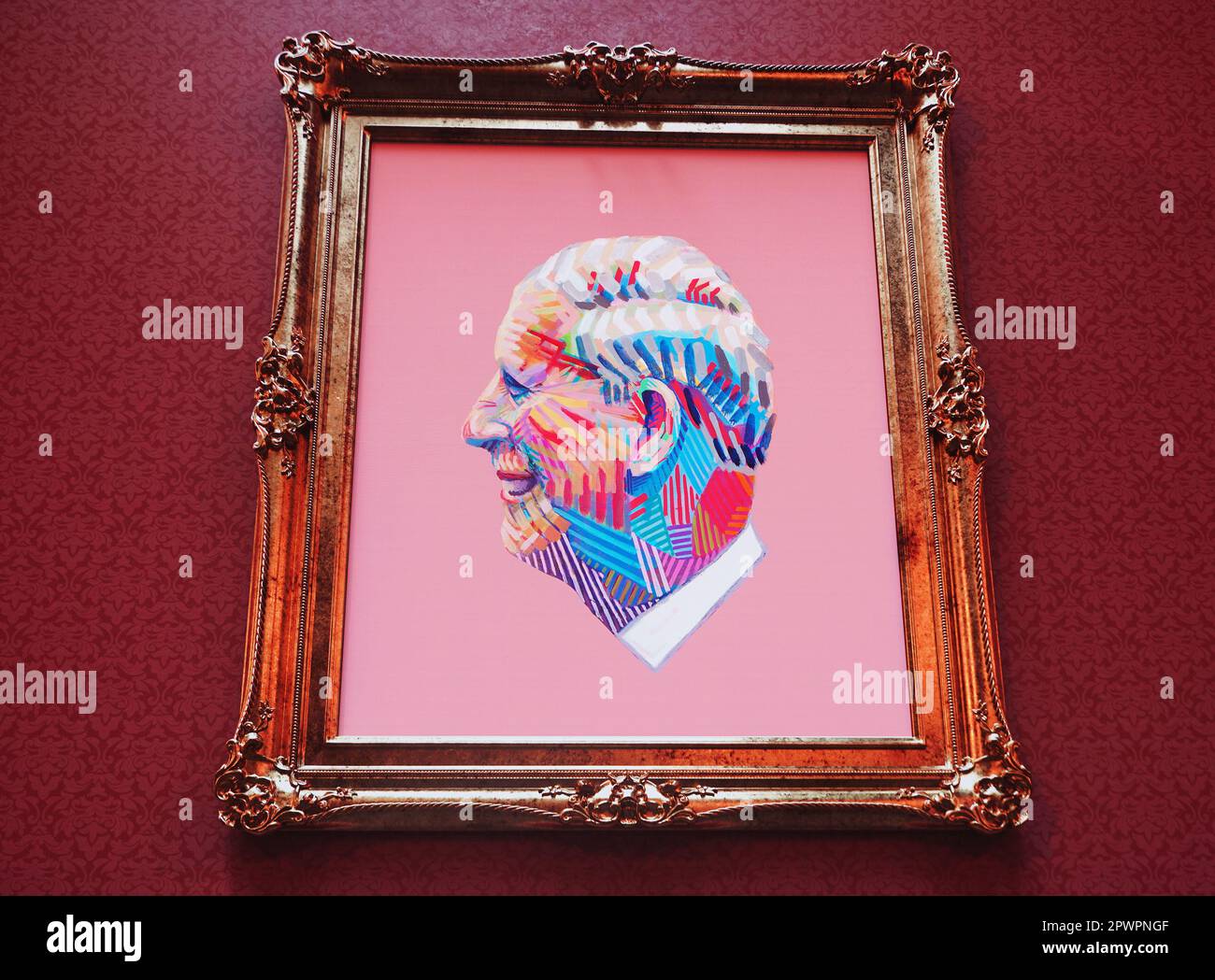 A digital portrait of King Charles III is unveiled on the screens at ...