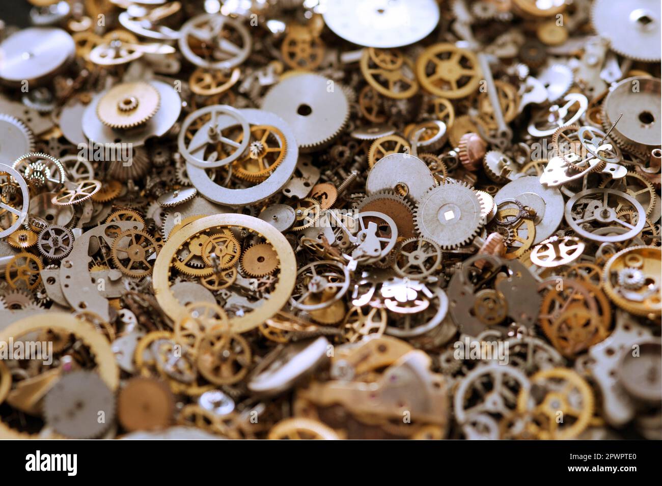 a background of complicated gears and cog wheels Stock Photo - Alamy