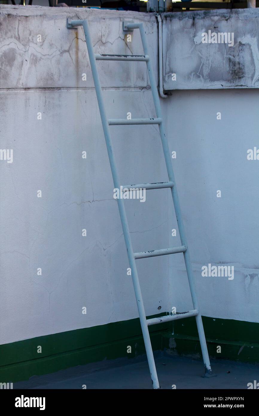 Person up ladder repair hi-res stock photography and images - Alamy