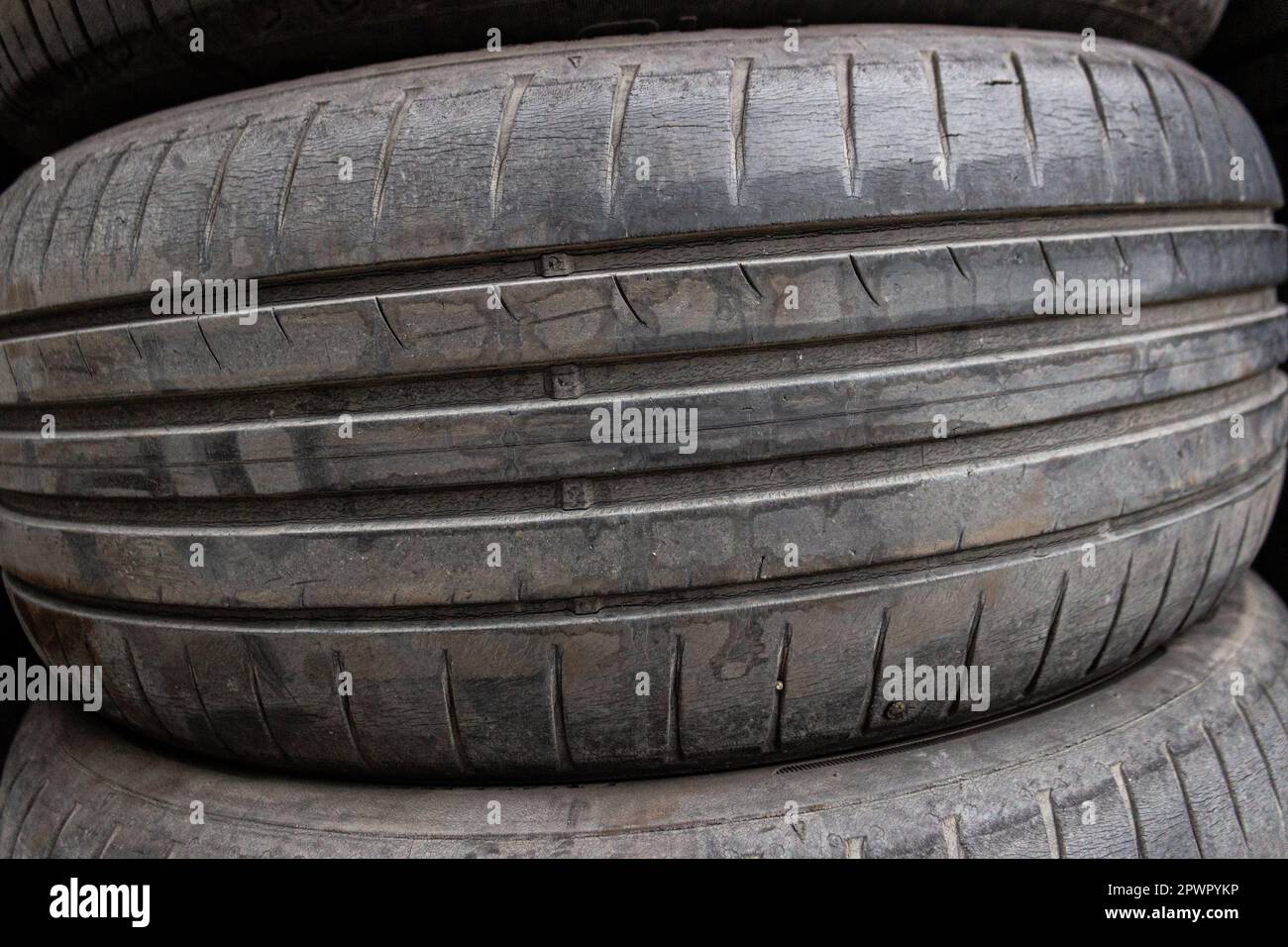 A closeup of tires stacked on each other Stock Photo - Alamy