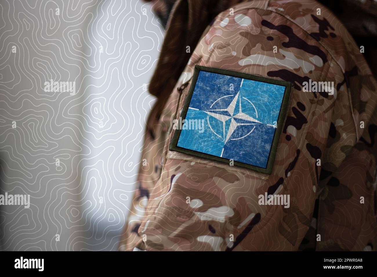 NATO Soldier. Soldier with flag NATO, NATO flag on a military uniform ...