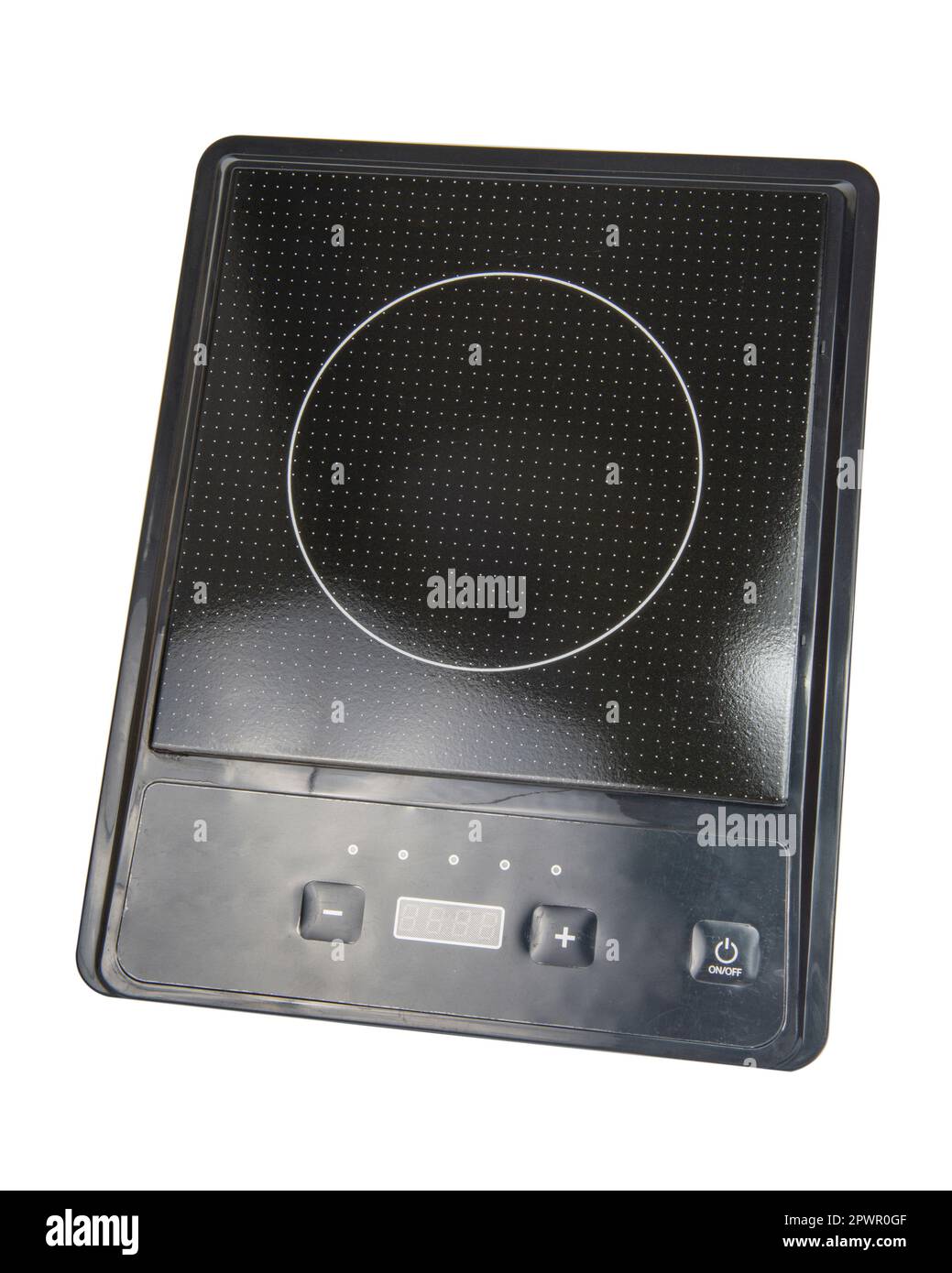 Induction cooker plate isolated on white background Stock Photo - Alamy