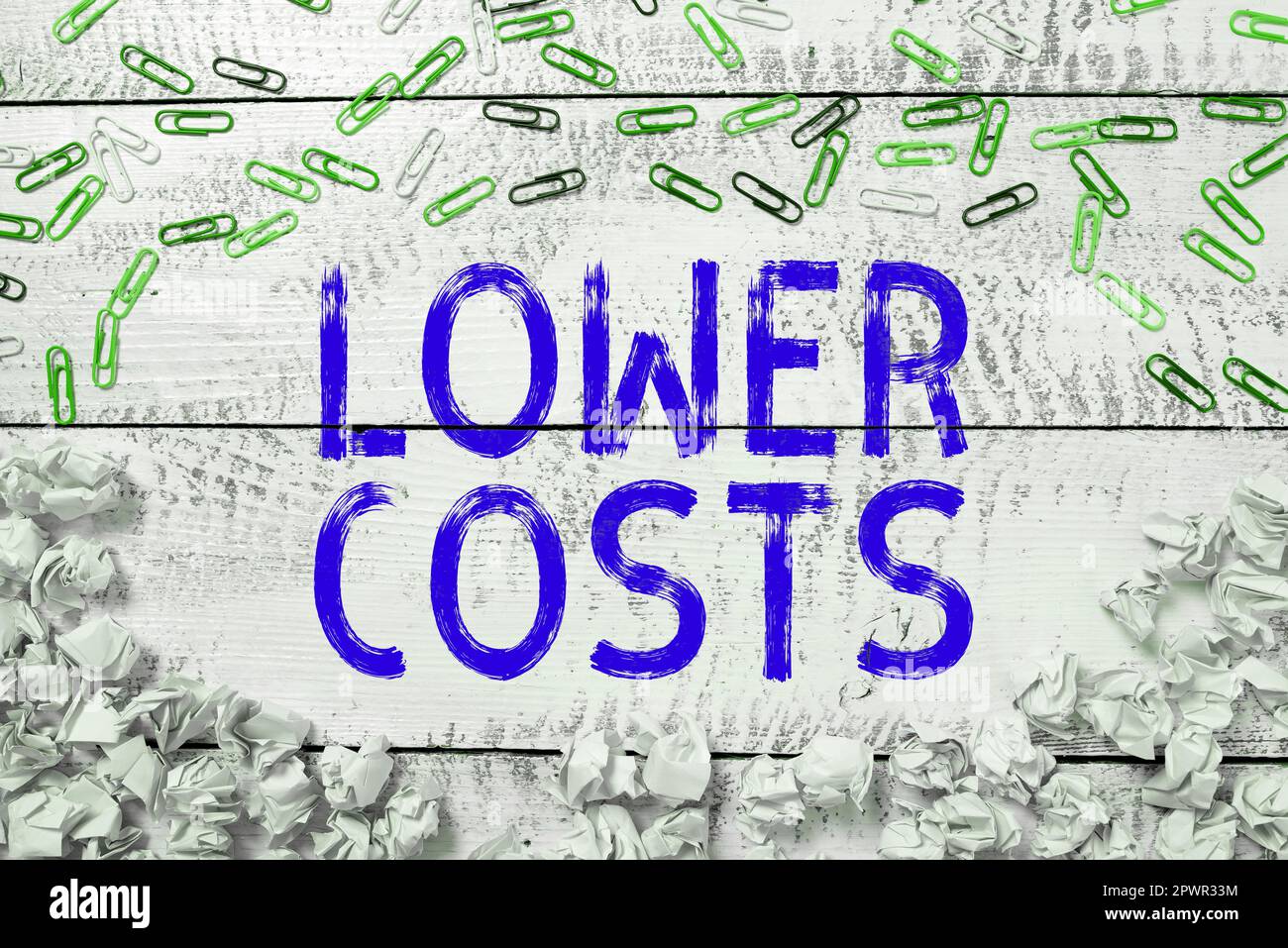 Text caption presenting Lower Costs, Conceptual photo the business sets ...