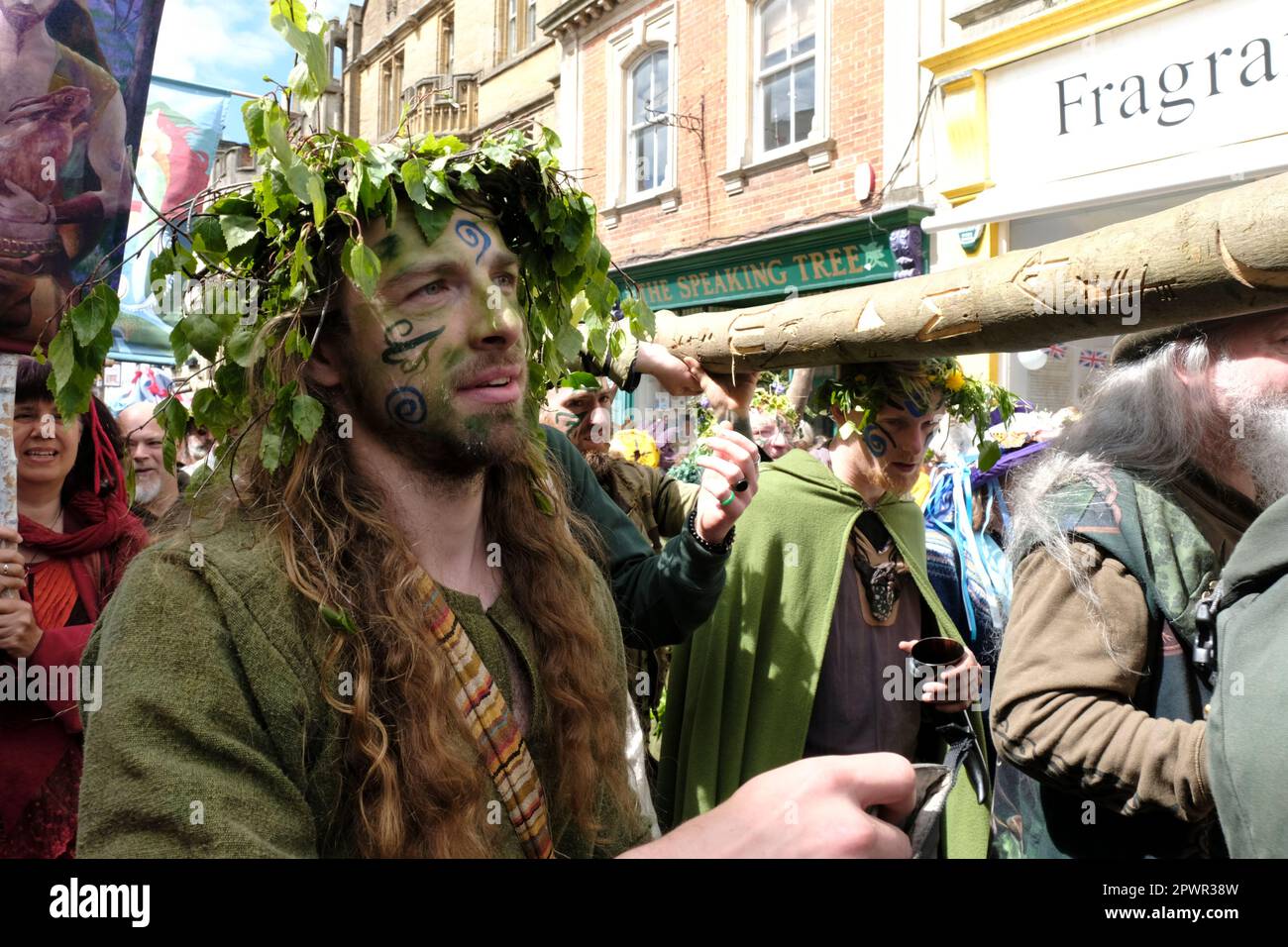 Glastonbury, Somerset, UK. 1st May 2023. A green man carries the may ...