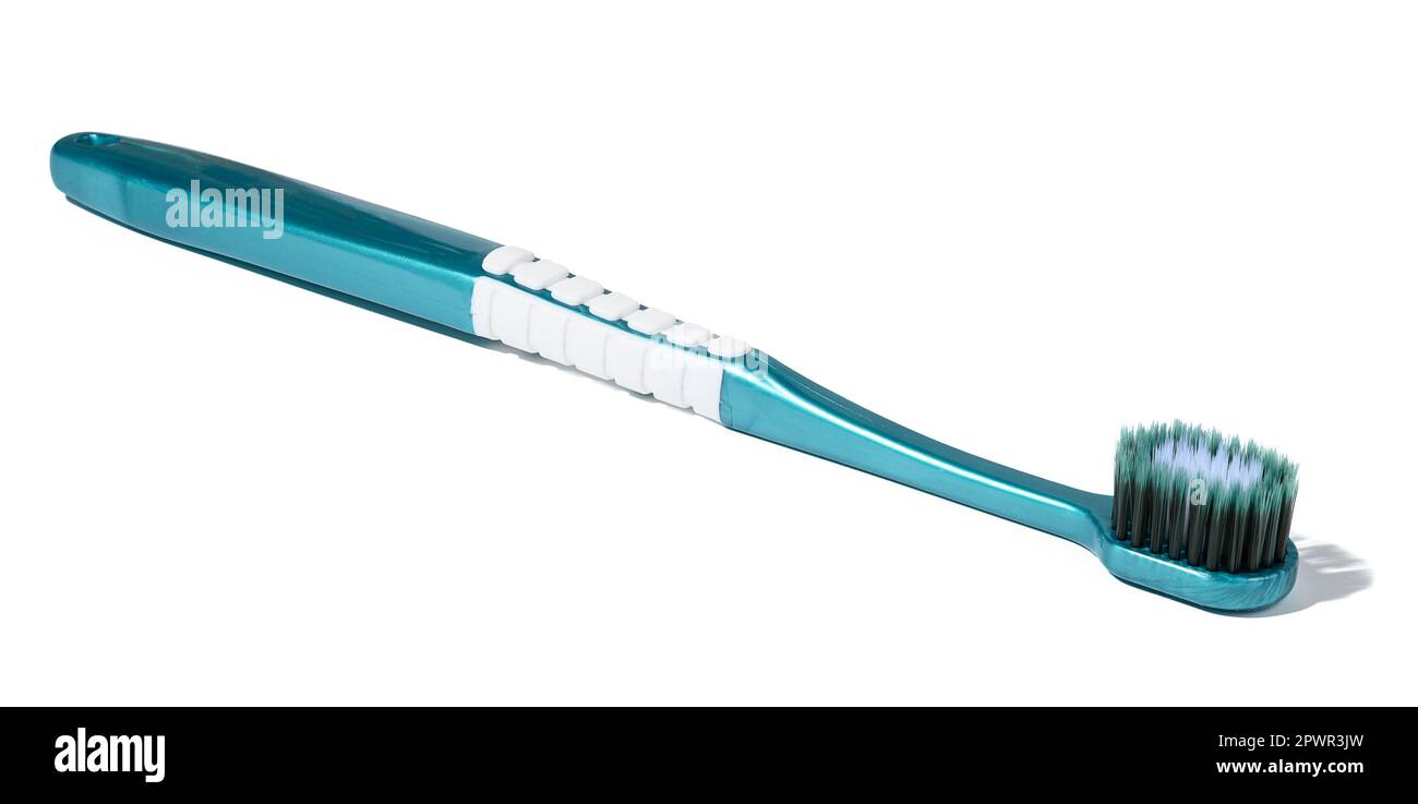 Plastic toothbrush on a white isolated background Stock Photo - Alamy