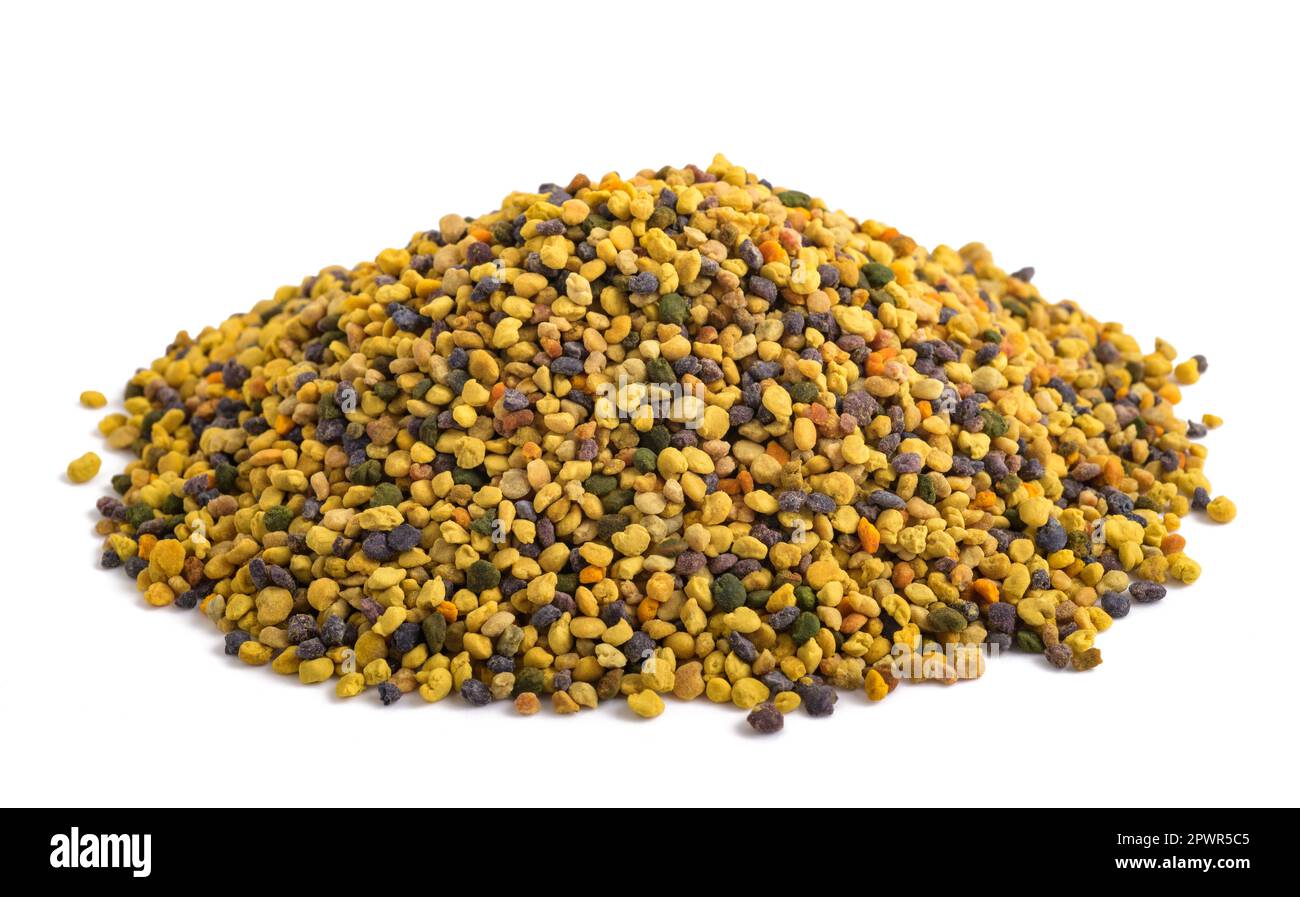 Bee pollen pile isolated on white background Stock Photo - Alamy
