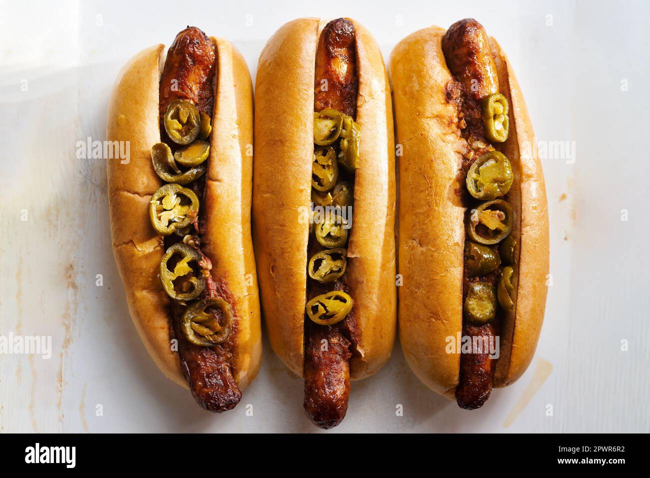 rustic american street food spicy chili hotdog Stock Photo - Alamy