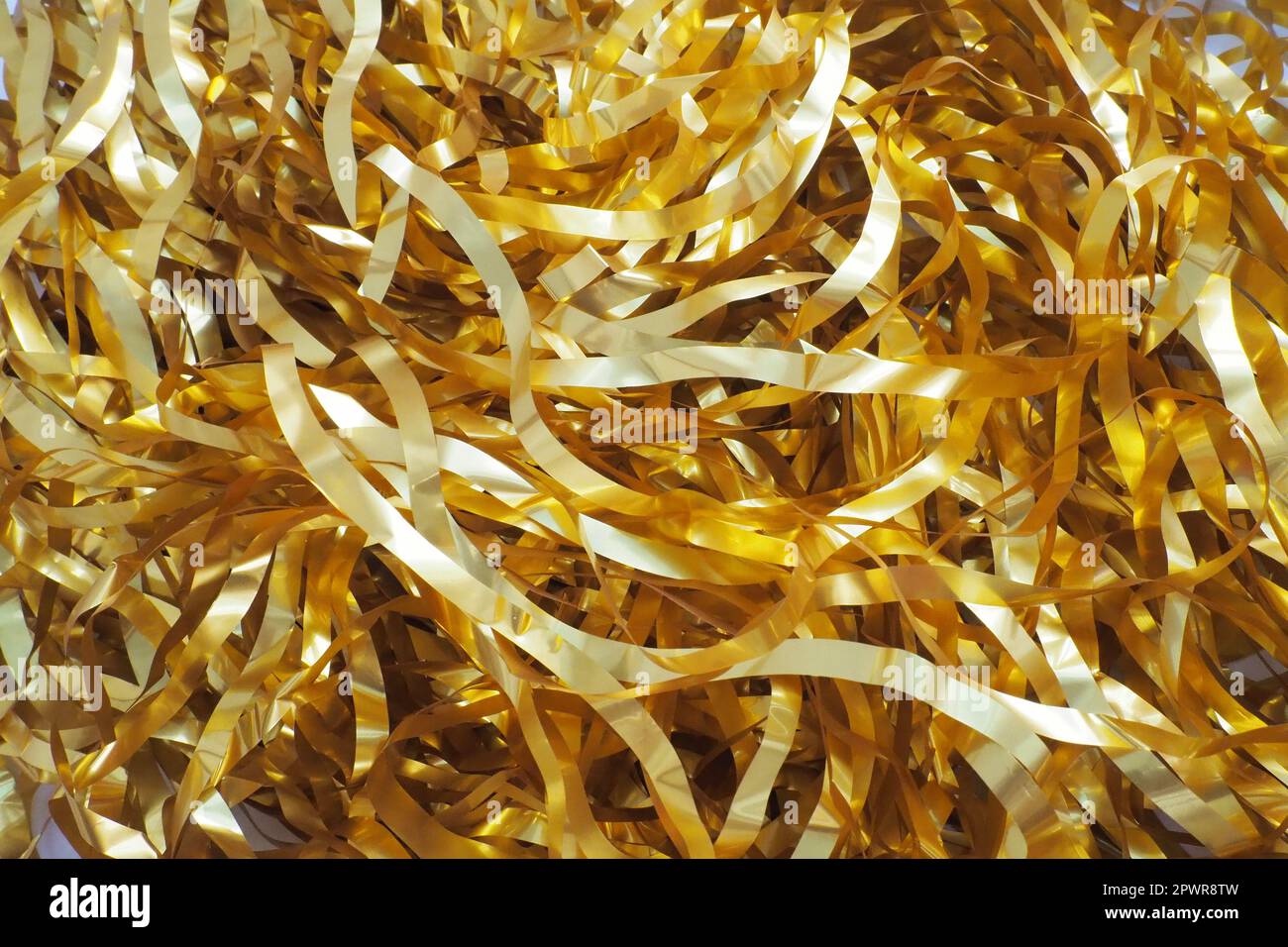 Tinsel-rain of golden color. New Year and Christmas decorations for the ...