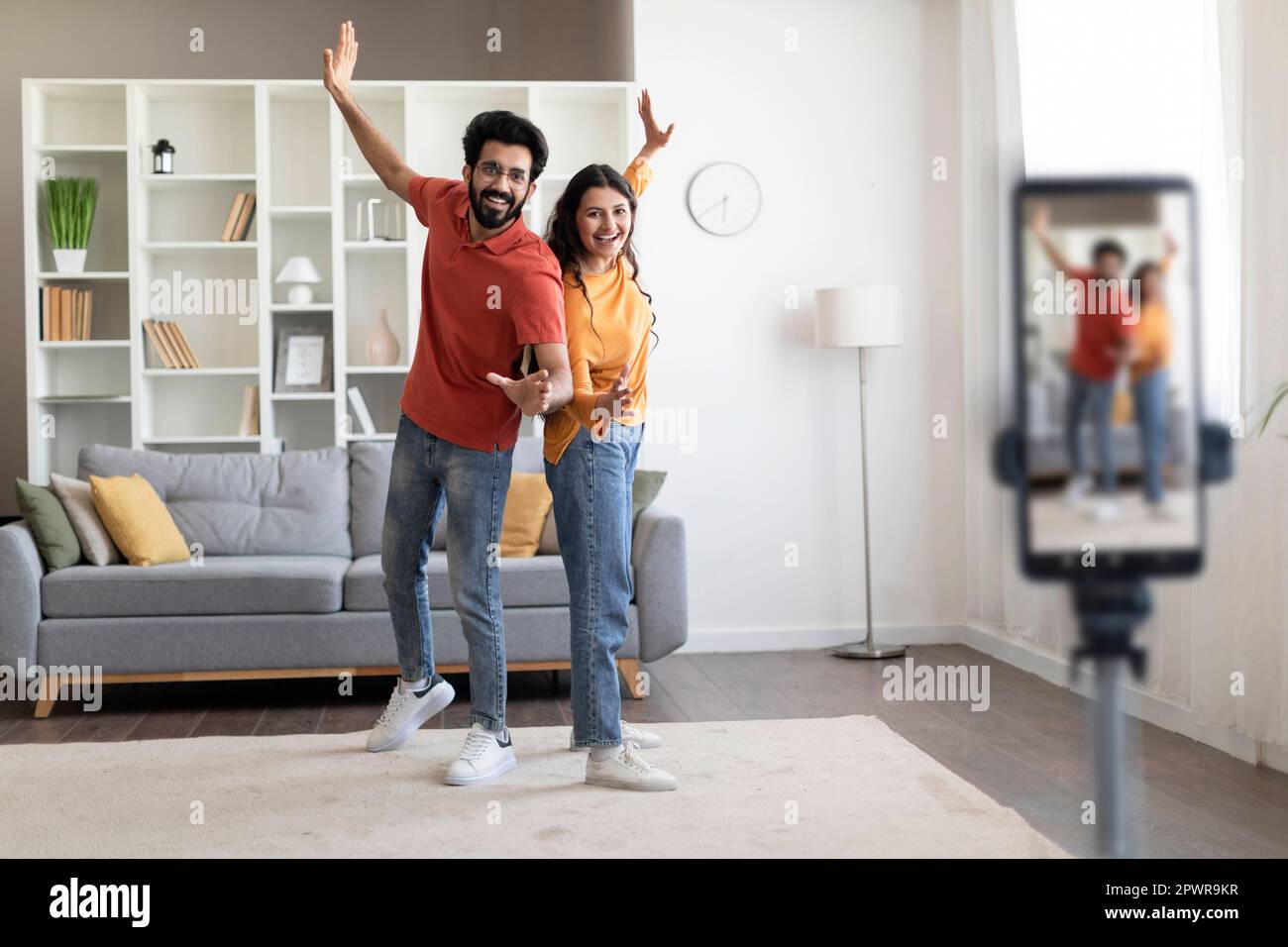 Woman recording dance video man hi-res stock photography and images - Alamy