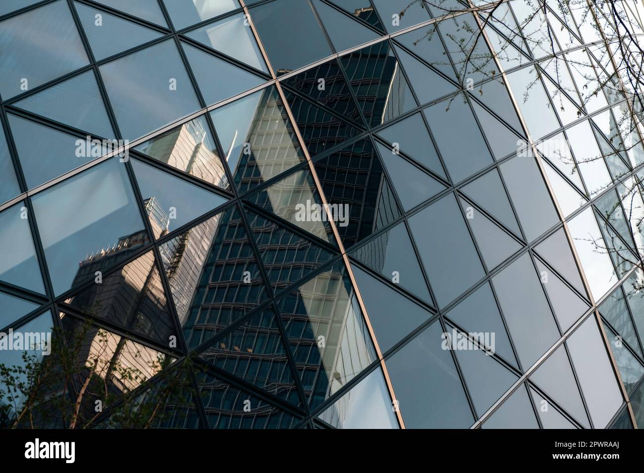 Close up of Gherkin building in the city of london. The glass panes ...