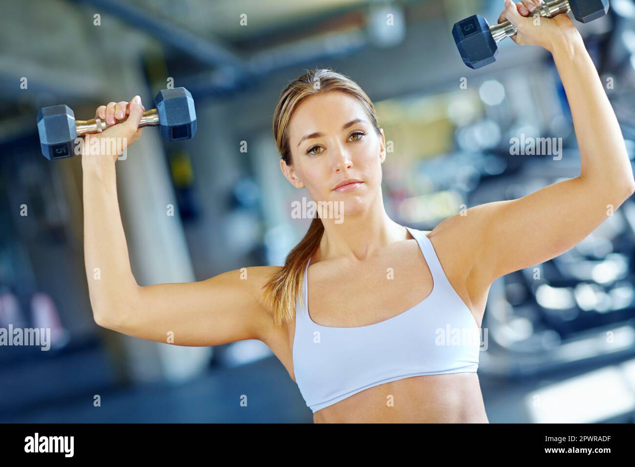 Im making great progress. A beautiful young woman working out at the ...