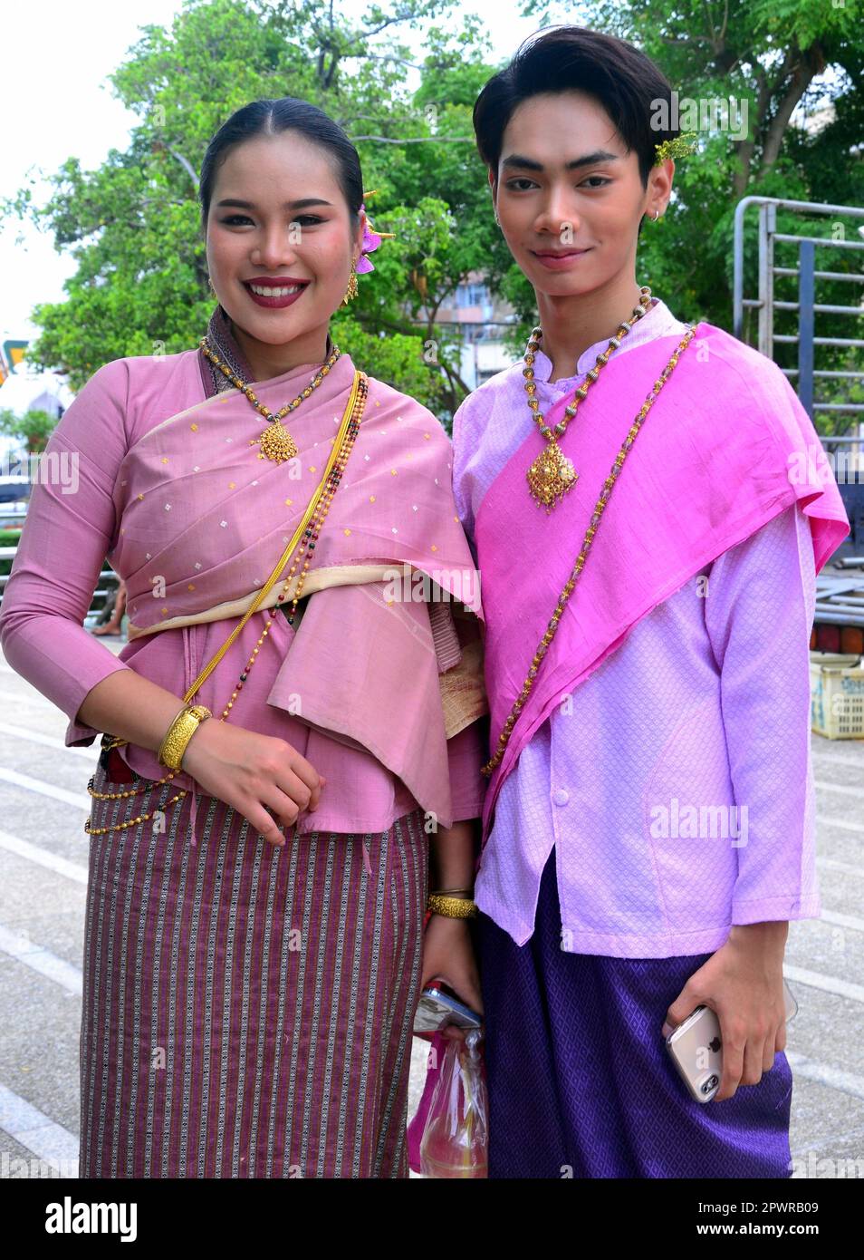 A female dancer and a male dancer in traditional Thai dress or costume ...